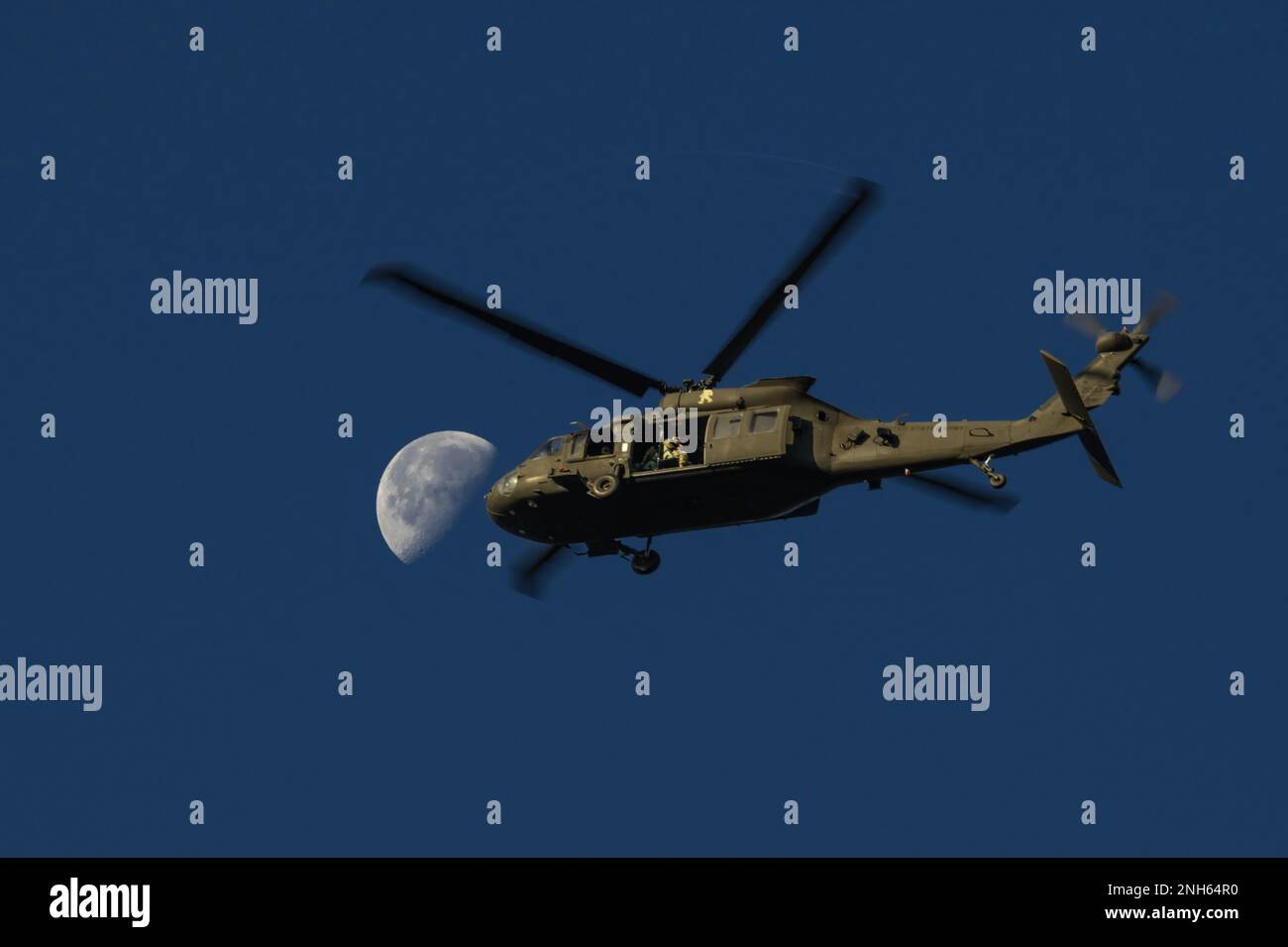 A UH-60 Blackhawk flies overhead during the Week of the Bayonet ...