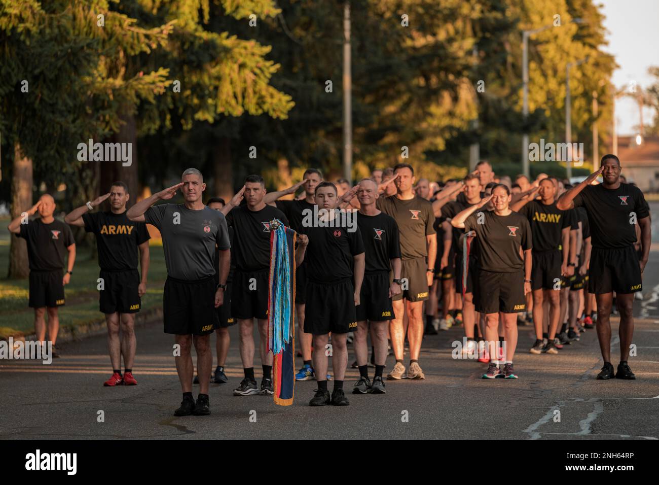 Maj. Gen. Stephen Smith and members of 7th Inf. Div. salute the flag ...