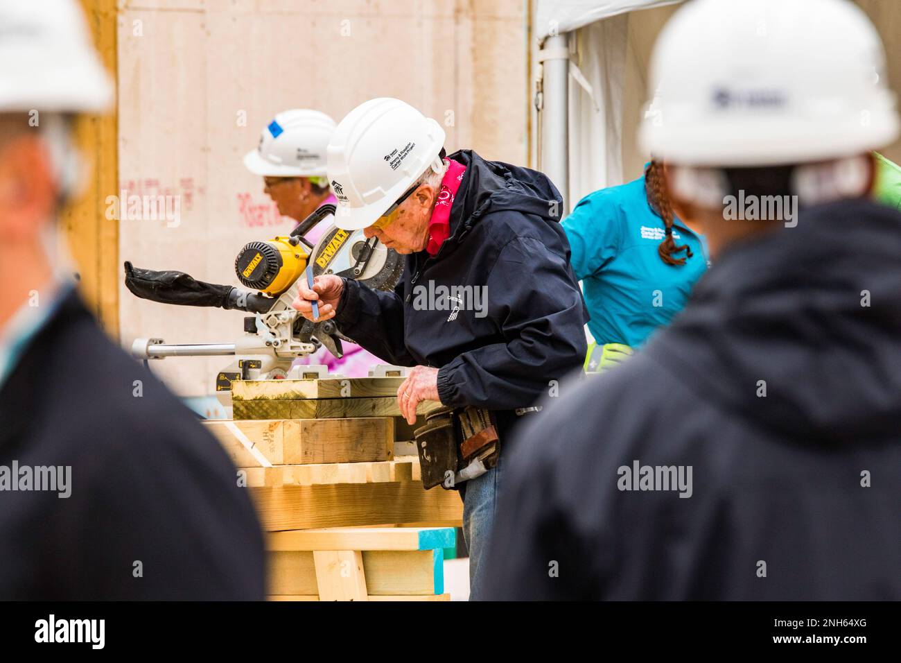 93 year old President Jimmy Carter puts his saw skills to use at the ...