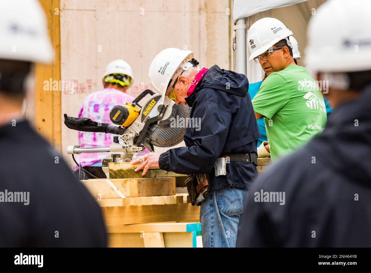 93 year old President Jimmy Carter puts his saw skills to use at the ...