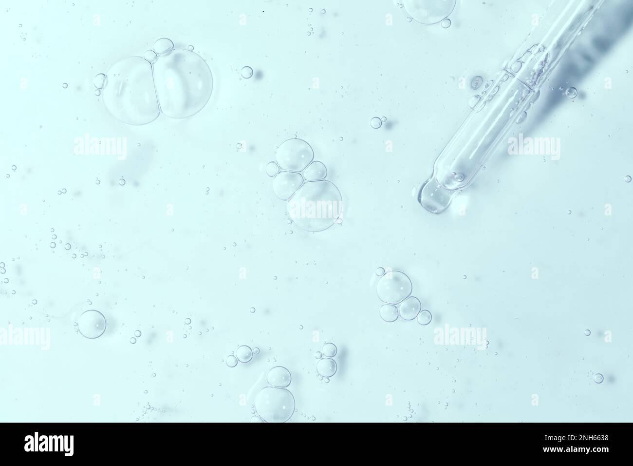 Cosmetic serum texture with dropper transparent liquid background Stock ...