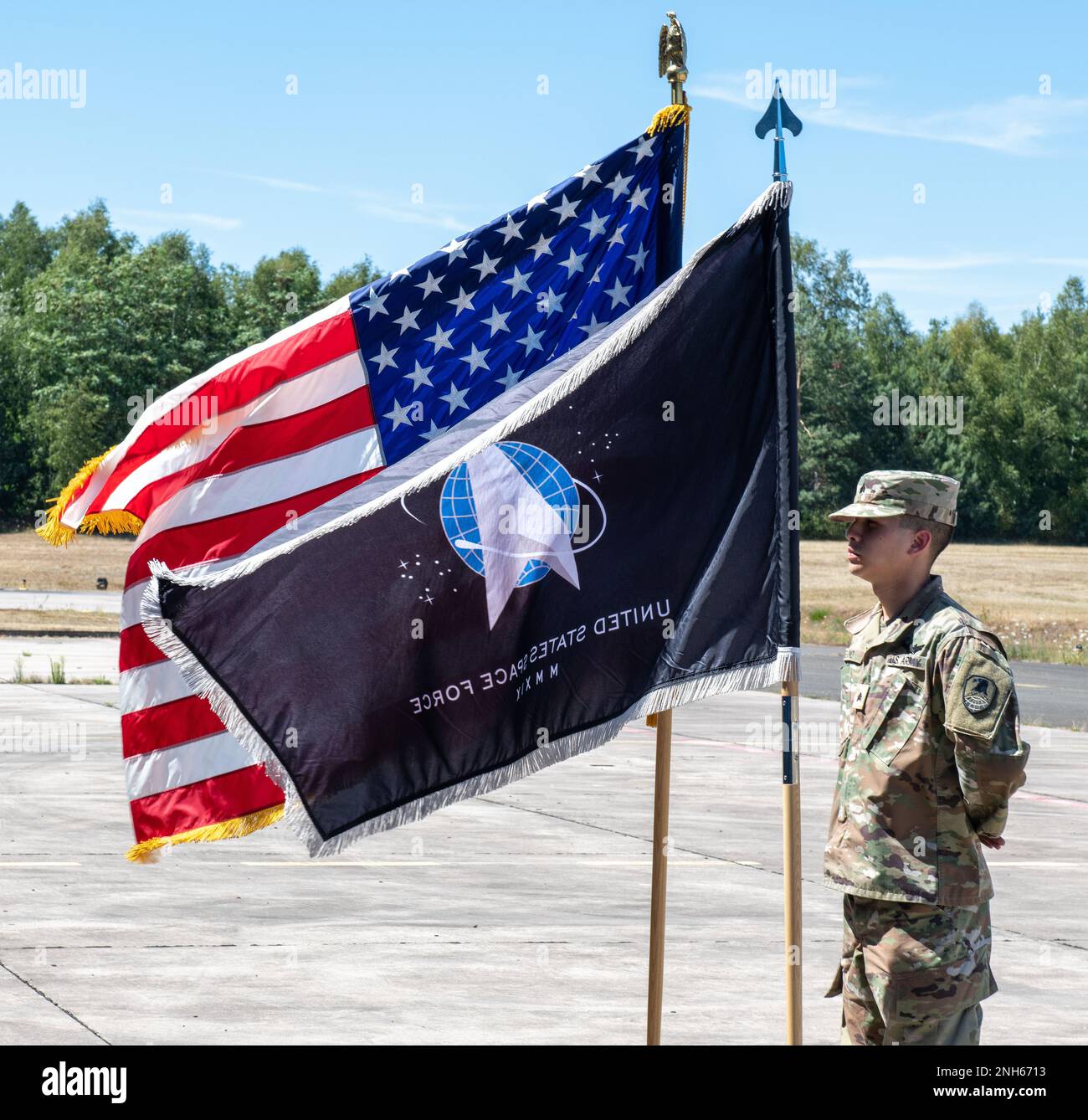U.S. Army Sgt. Andres Trevino Jr. guards the Flags during the 53d Space ...