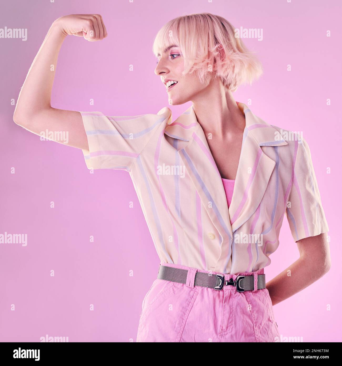 Woman, flexing arm muscle and smile, power and strong female and winner ...