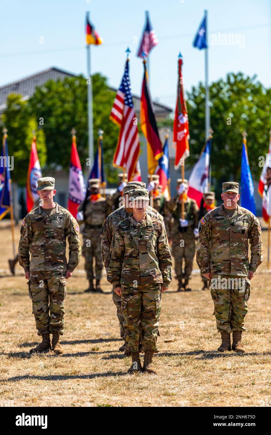 U.S. Soldiers from the 102d Signal Battalion stand at attention during ...