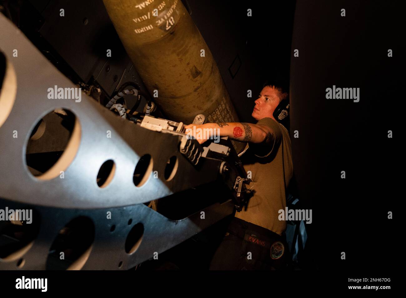 U.S. Air Force Staff Sgt. Beth Evans, a weapons load team chief ...