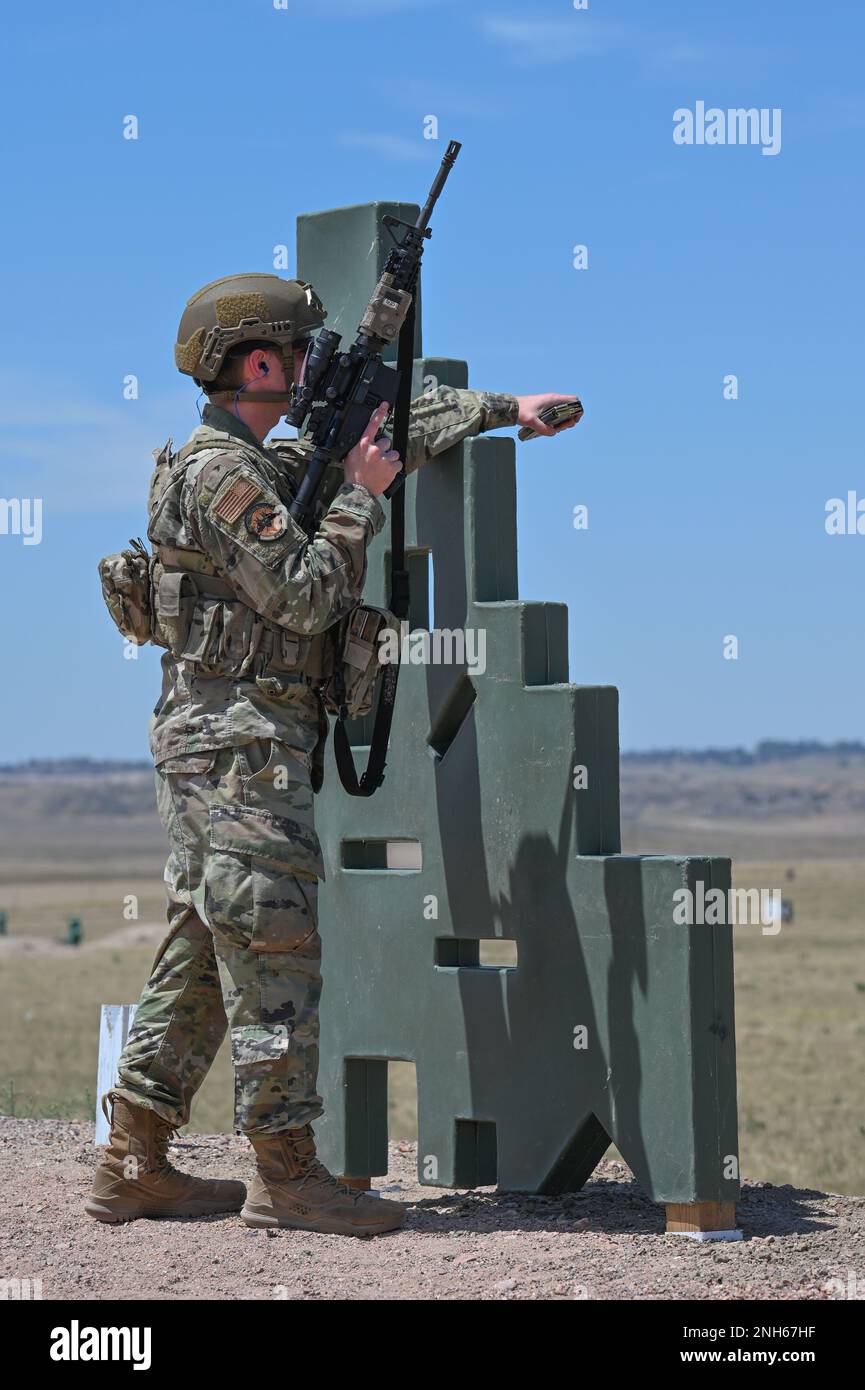 A defender with the 890th Missile Security Forces Squadron prepares to begin weapons training ...