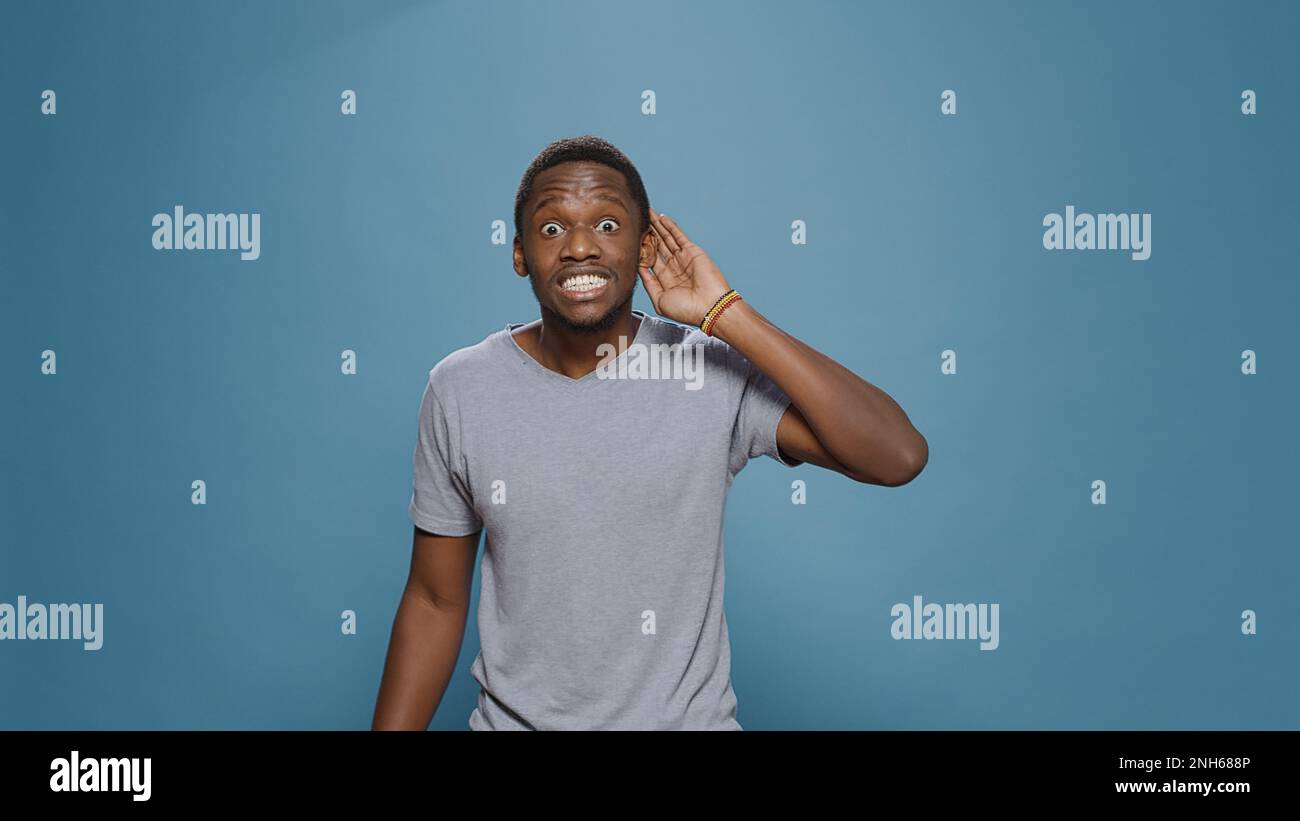 African american adult eavesdropping on hi-res stock photography and ...