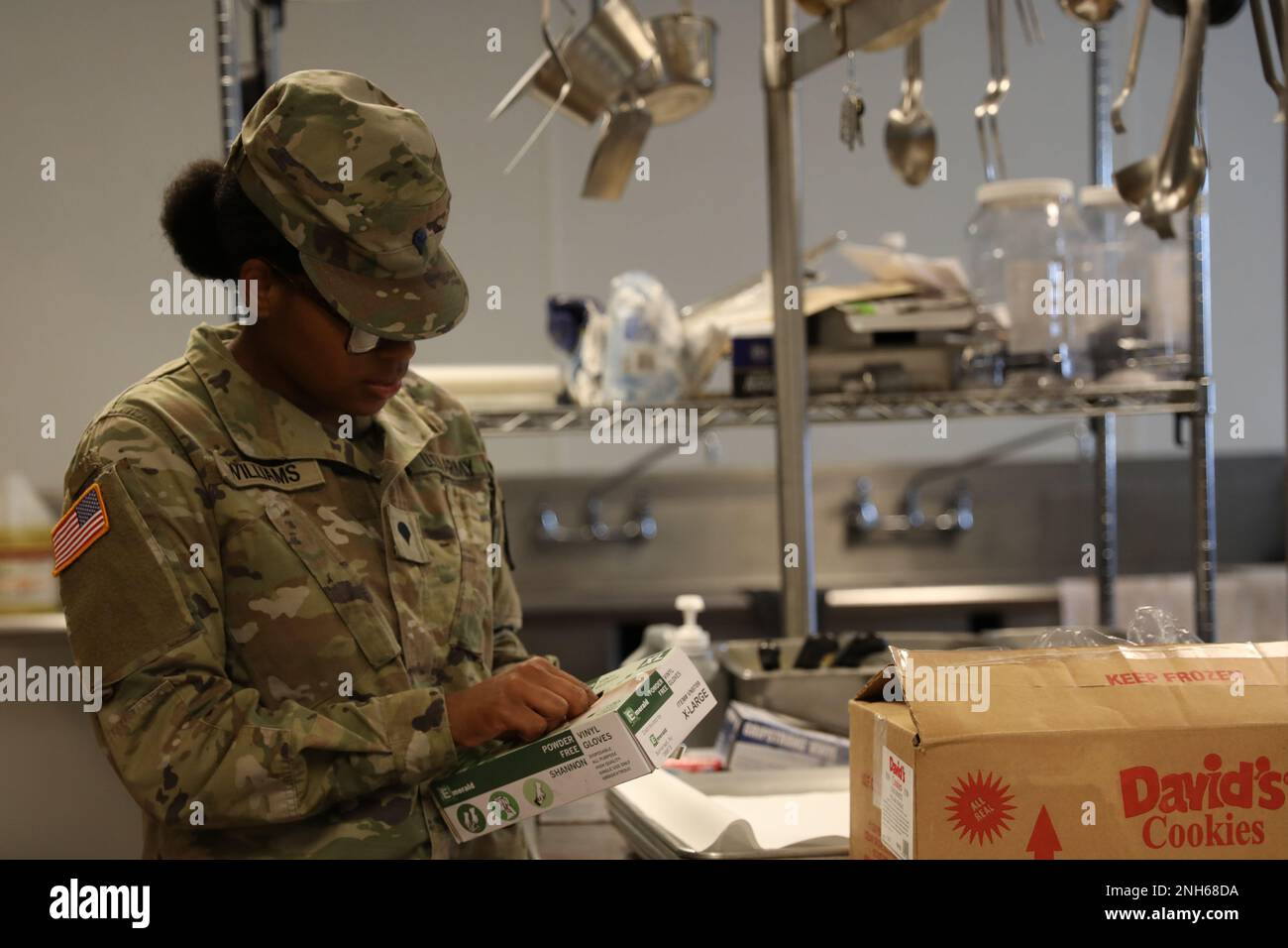 Spc. Monique Williams, a culinary specialist assigned to the 1069th ...