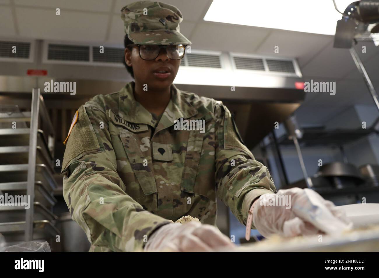 Spc. Monique Williams, a culinary specialist assigned to the 1069th ...