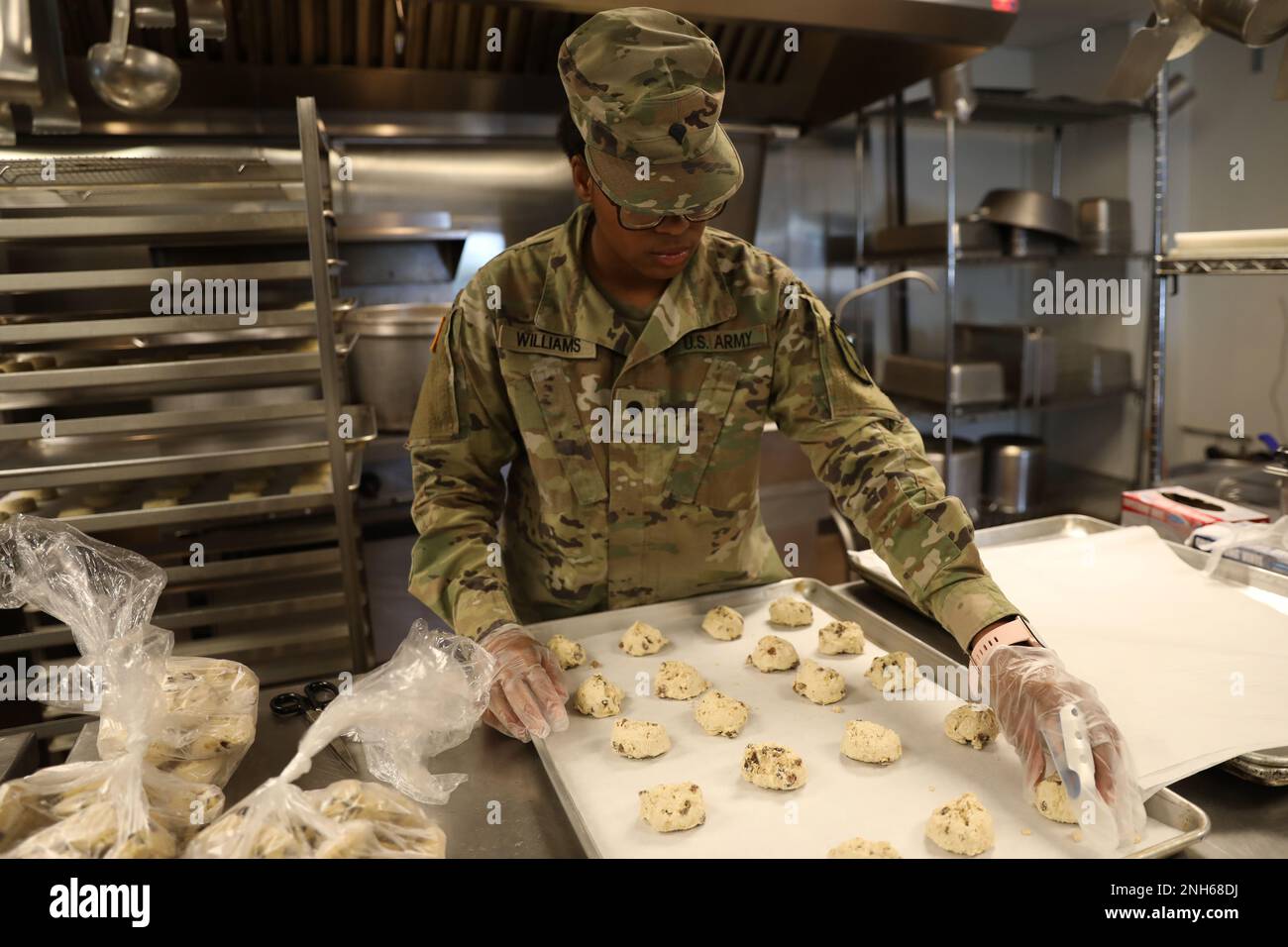 Spc. Monique Williams, a culinary specialist assigned to the 1069th ...