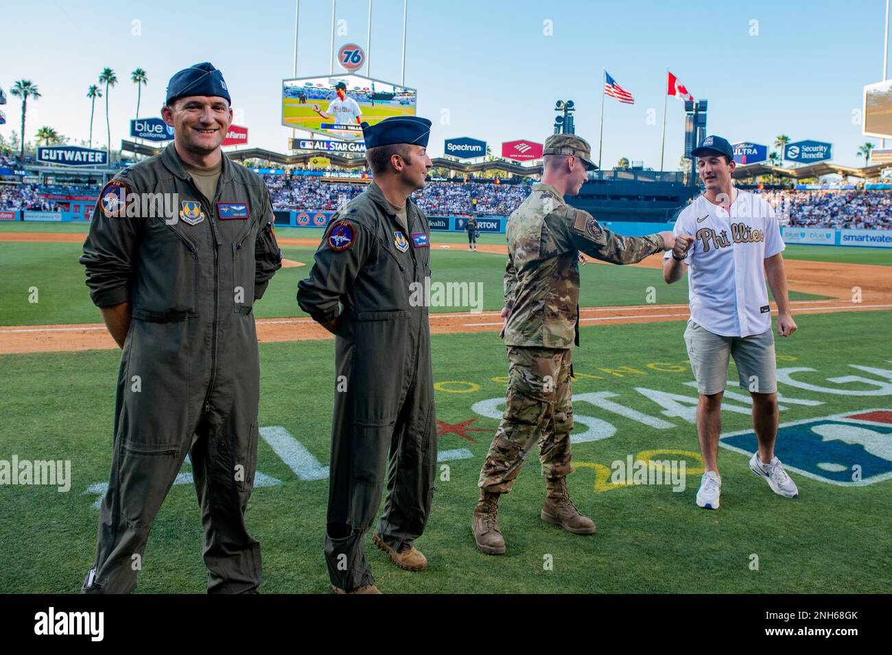 “Top Gun: Maverick” actor Miles Teller fist bumps Senior Airman Michael ...