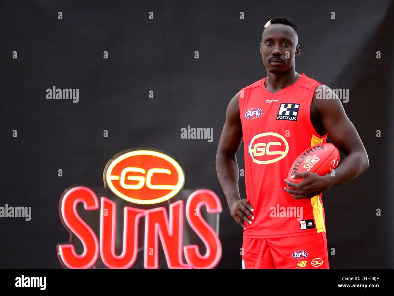 Mabior Chol during a Gold Coast Suns AFL Team Photo Day at the Gold ...