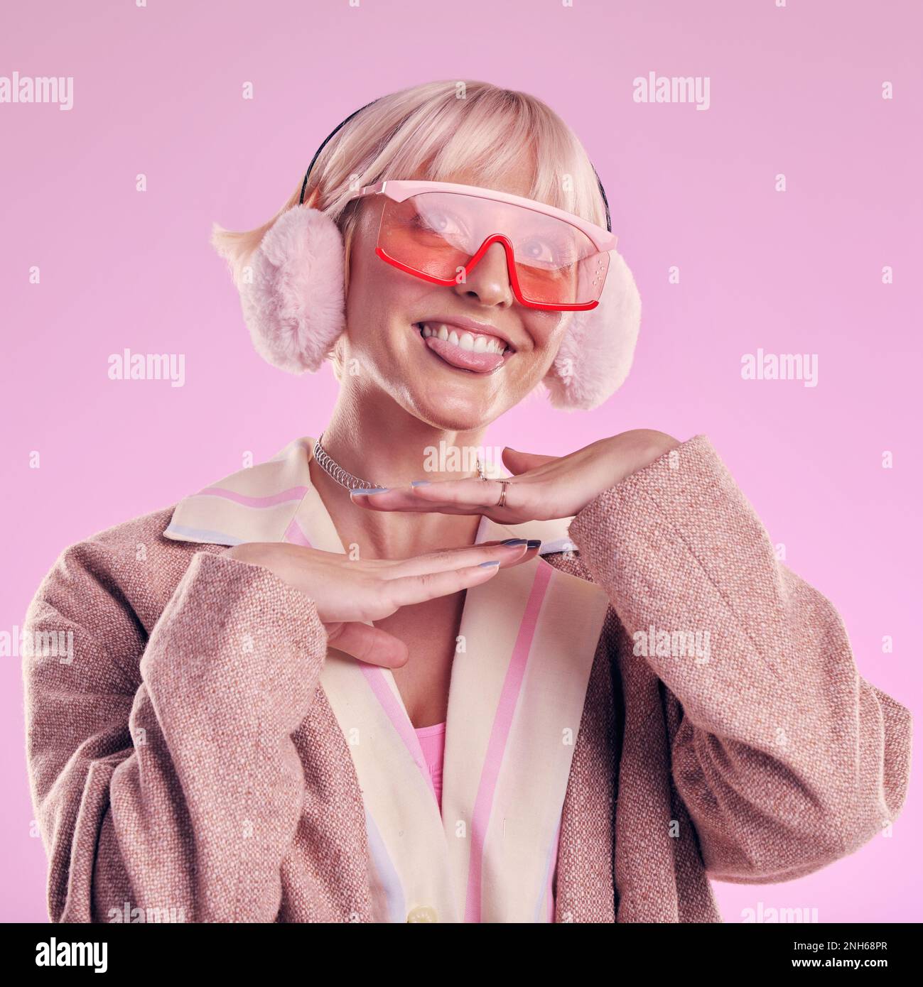 Fashion, tongue and funny face of a woman quirky in studio for comic ...