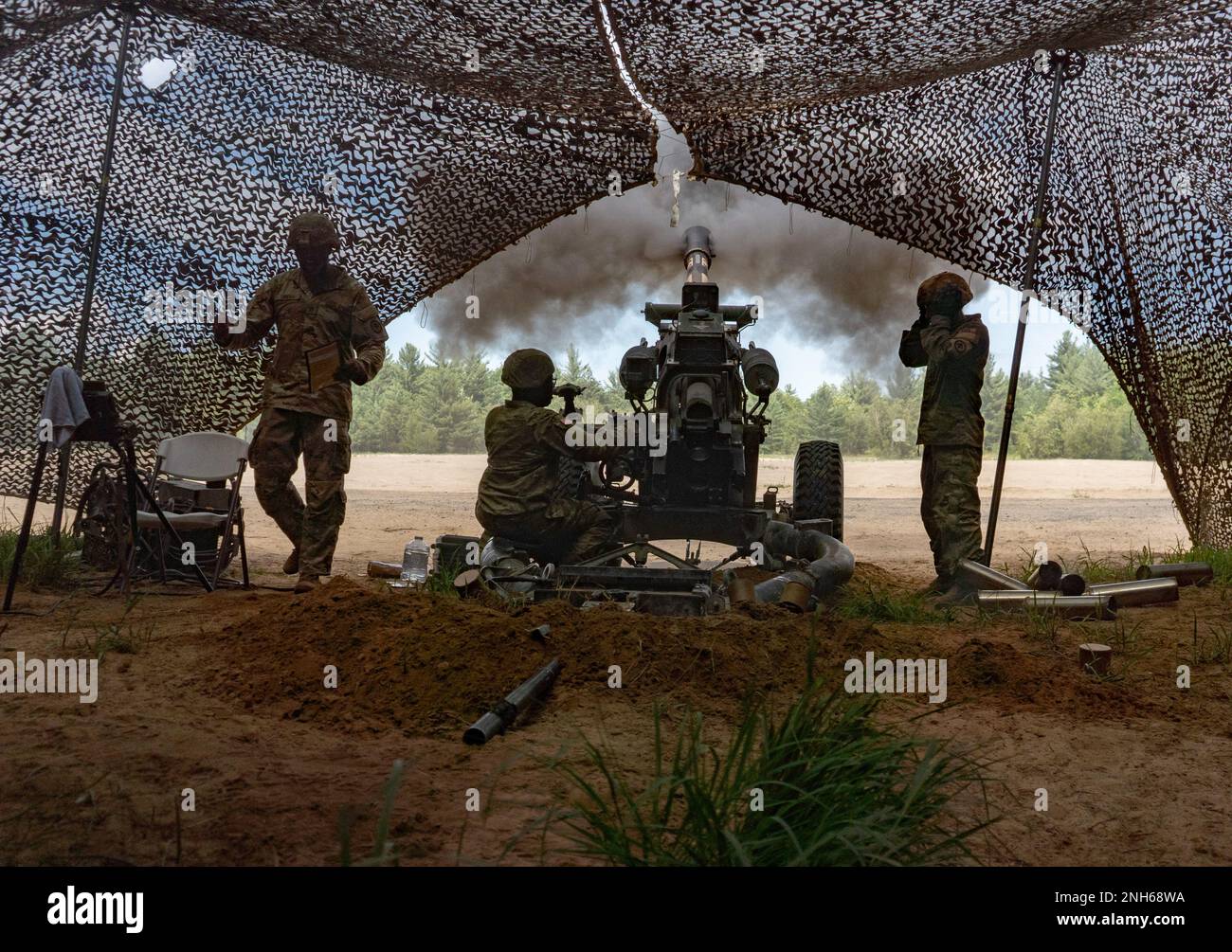 U.S. Army Soldiers from Bravo Battery, 3rd Battalion, 112th Field Artillery Regiment, 44th ...