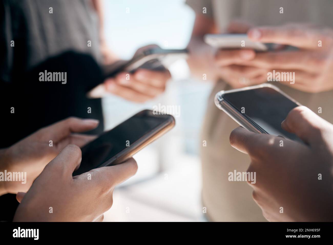 Hands, phone and people networking on social media, mobile app or ...