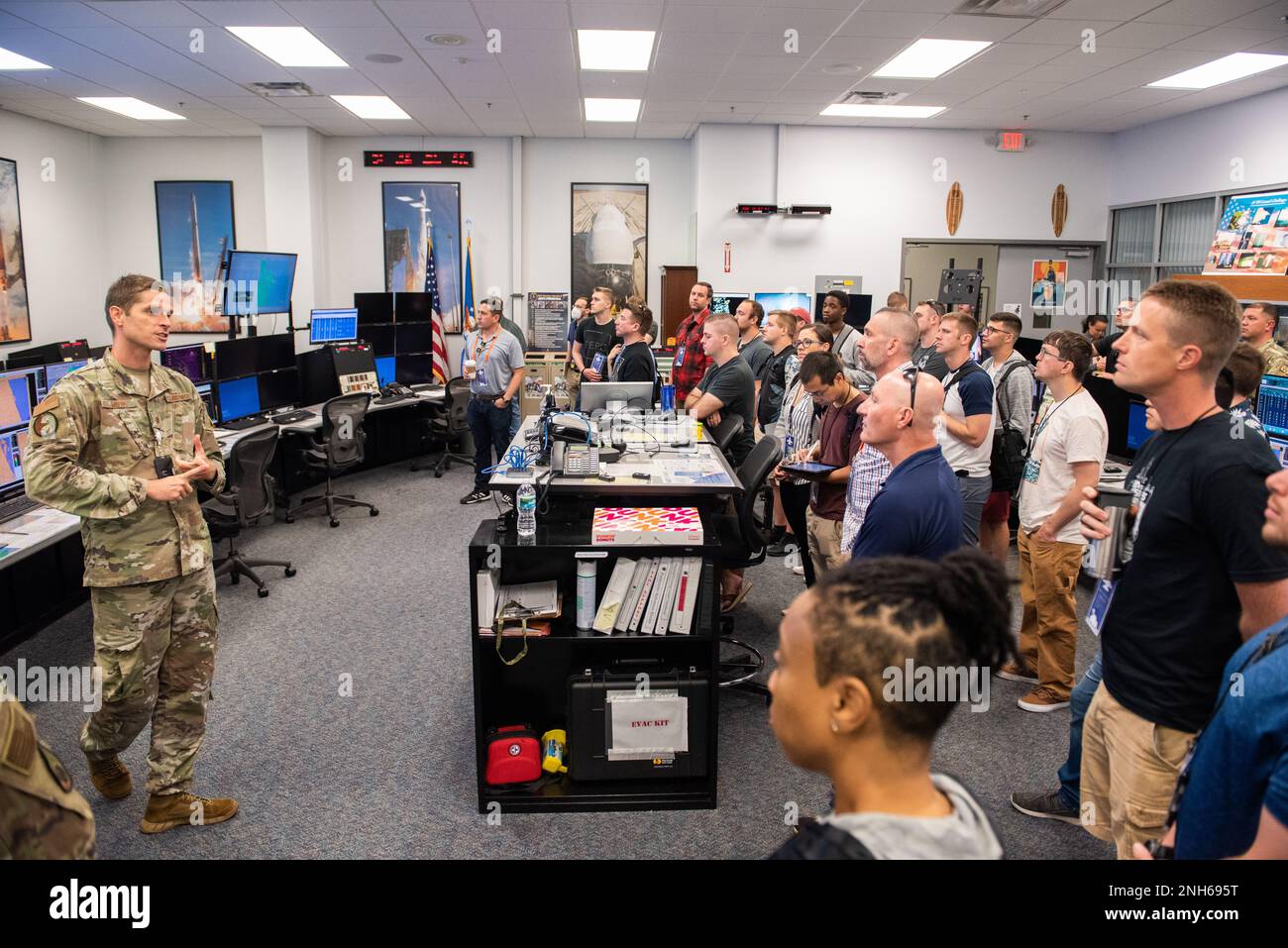 U.S. Air Force Maj. Nathan Motz, 45th Weather Squadron, delivers a ...