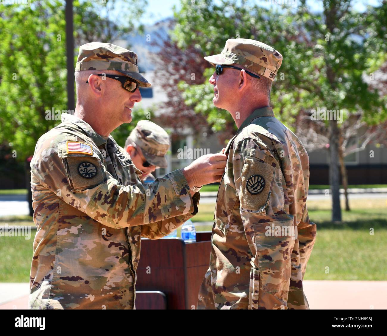 Command Sgt. Maj. Jerry Brown receives a commendation for his service ...