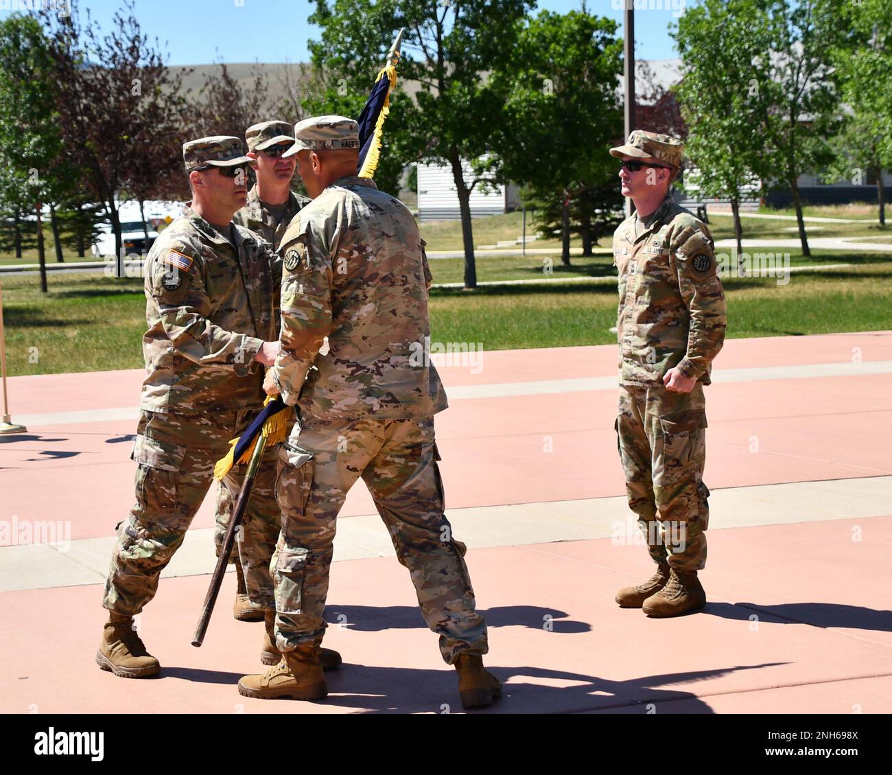 Command Sgt. Maj. Frederick Haerter passes the 95th Troop Command ...
