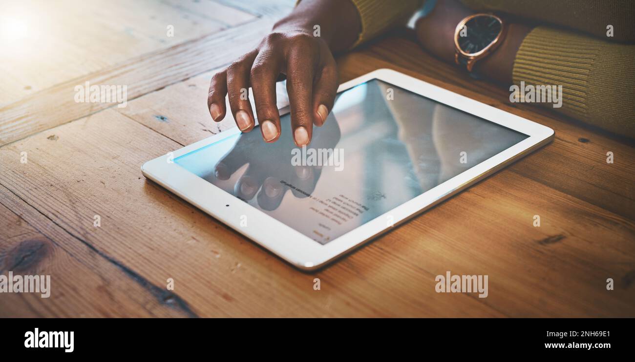 Productivity with one tap. a businessman using a digital tablet at his ...