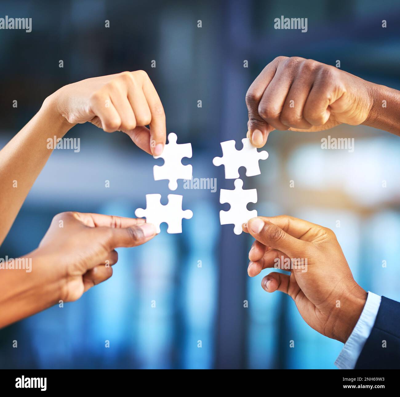 Small steps lead to big changes. a group of businesspeople completing a ...