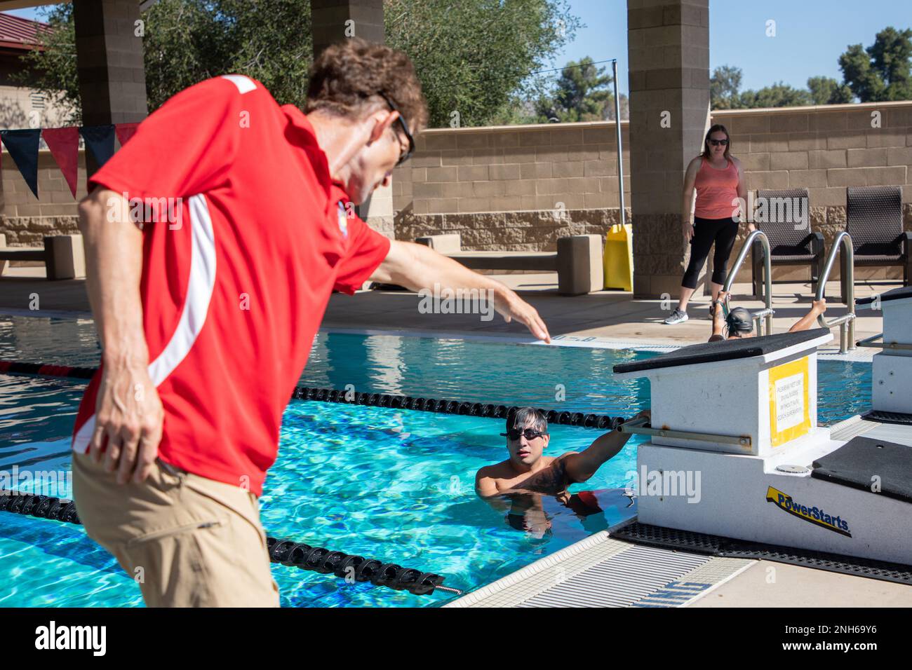 Recovering service members with Wounded Warrior Regiment swim during a ...