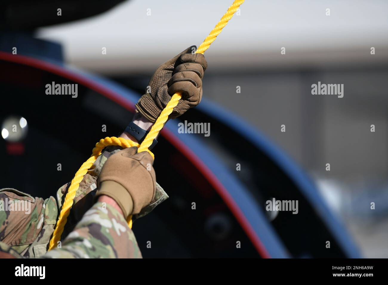 U.S. Air Force Airmen from the 92nd Maintenance Group load a boom ...