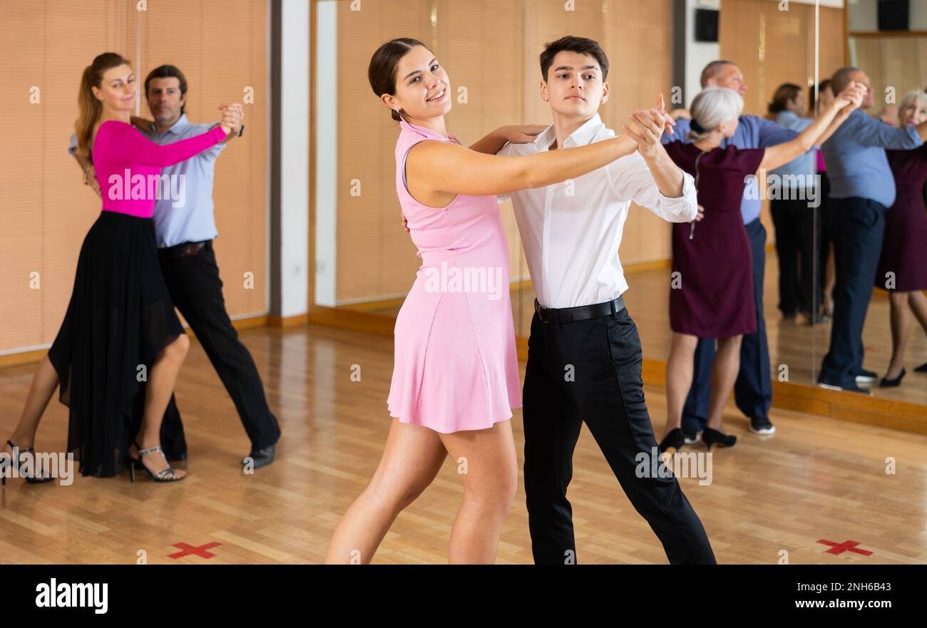 young woman with partner dance waltz Stock Photo - Alamy