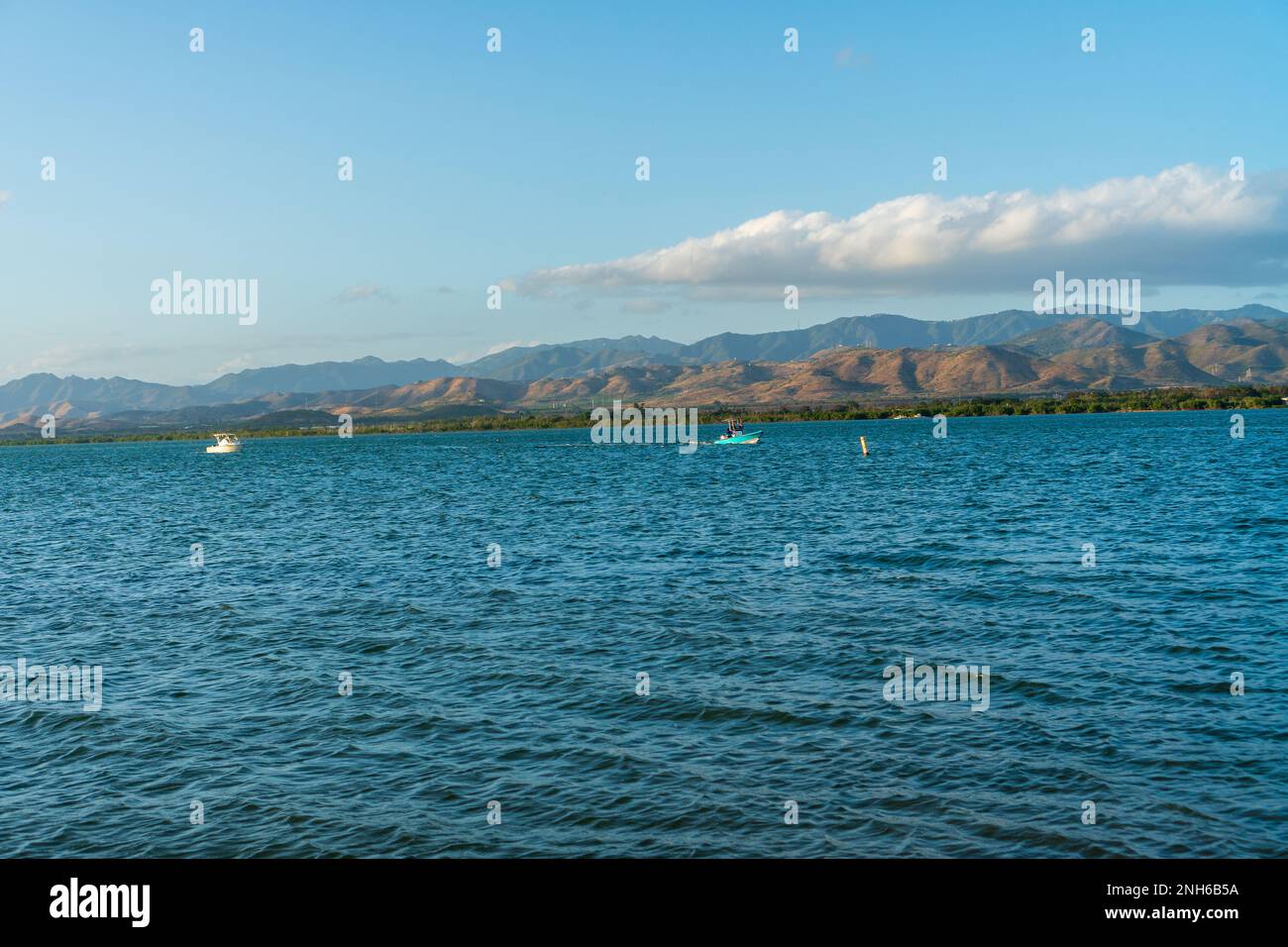 Guayama, Pozuelo Beach Landscape and mountains Stock Photo - Alamy