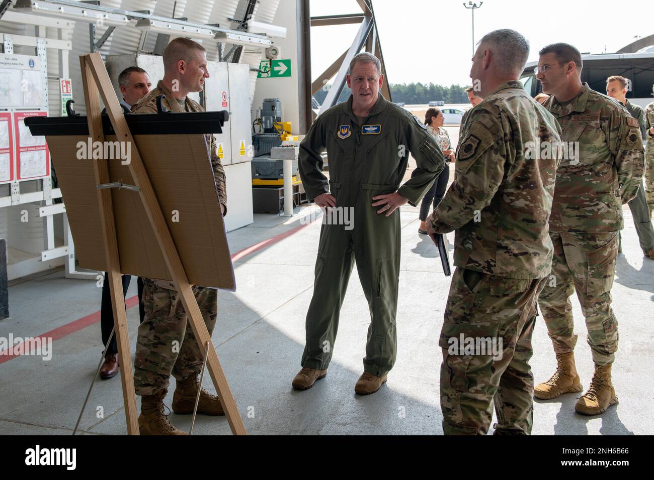 A U.S. Air Force Airman provides an immersion brief to General James ...