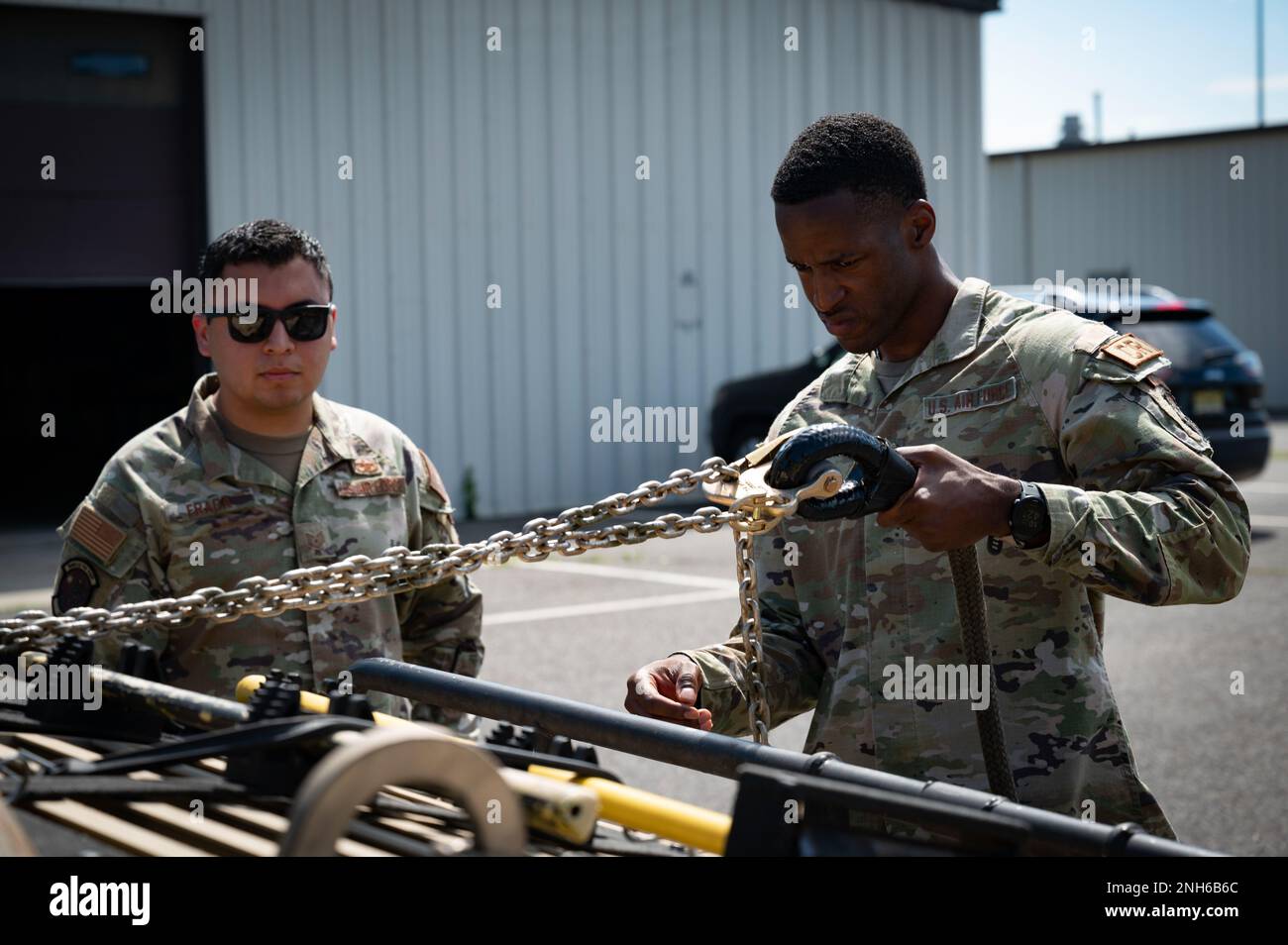 U.S. Tech Sgt. Nestor Fraga, left, 321St Contingency Response Squadron ...