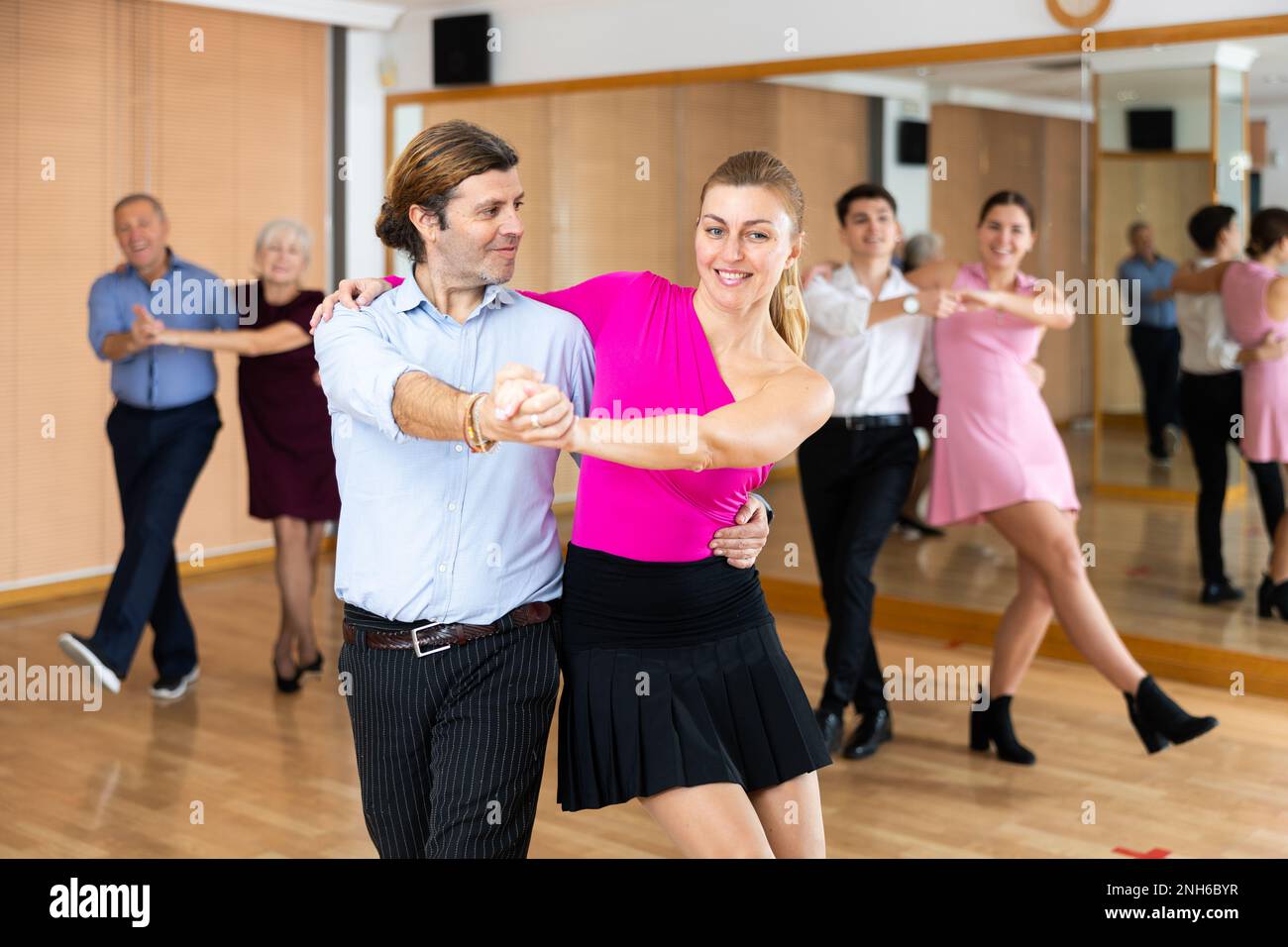 expirienced woman with partner in jive Stock Photo - Alamy