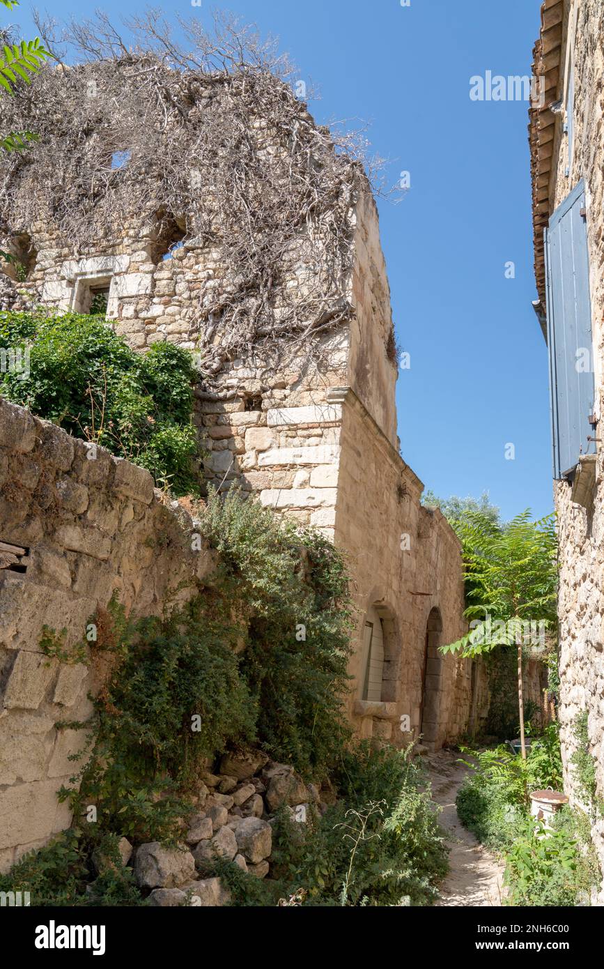 Narrow street in Oppede le Vieux village in Luberon France Stock Photo ...
