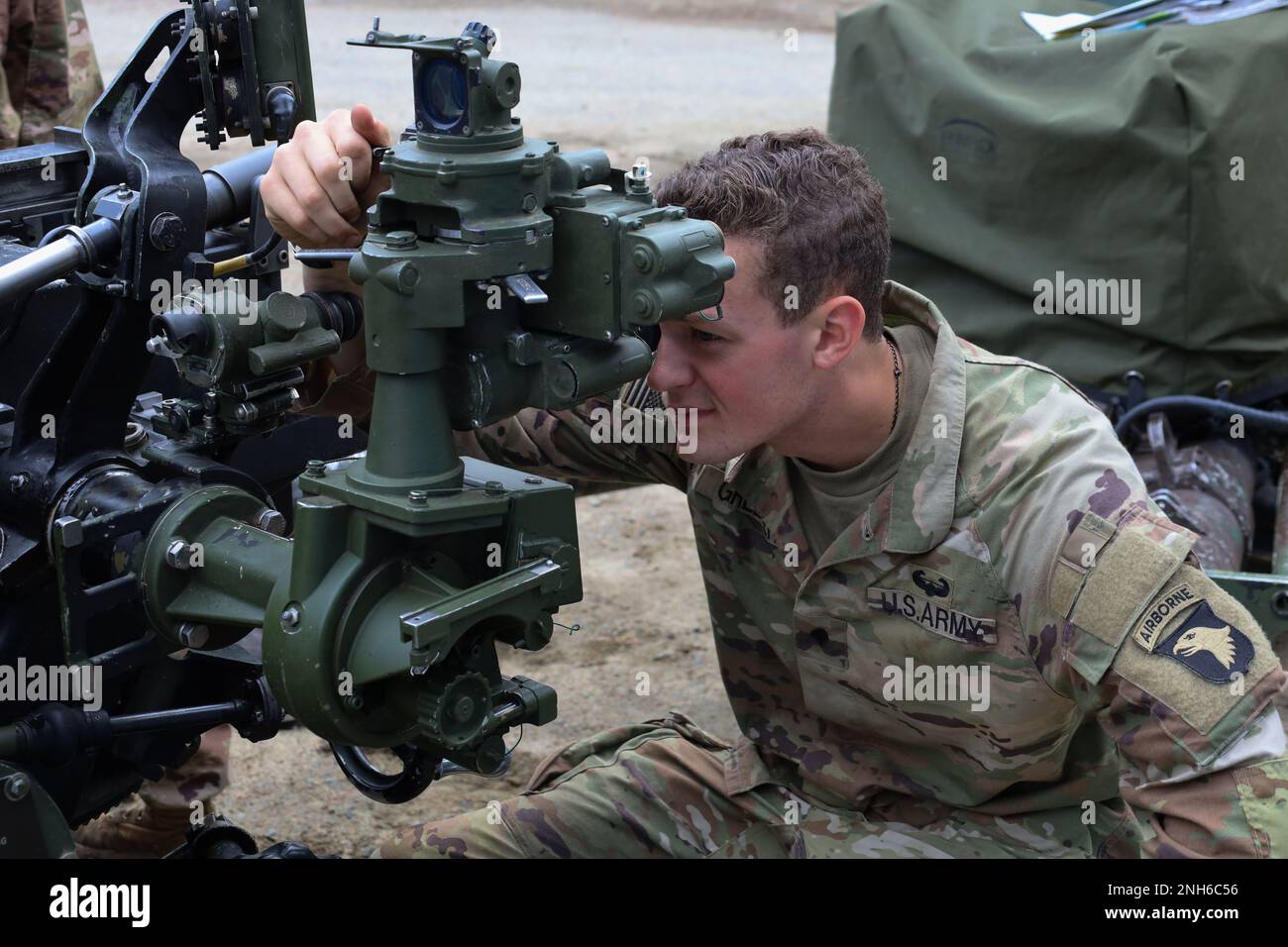 U.S. Army Spc. Colin Grebner, assigned to Bravo Battery, 1st Battalion, 320th Field Artillery ...