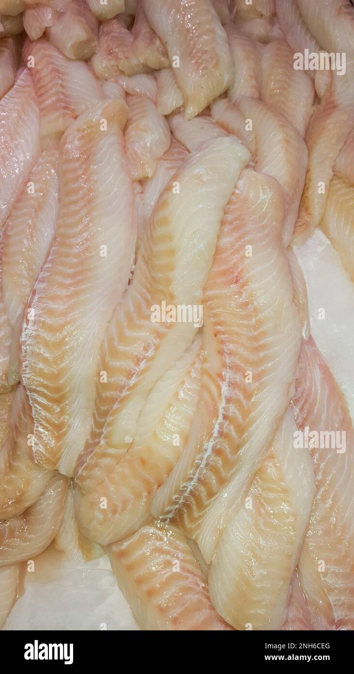 background fresh piece raw cod fish Stock Photo - Alamy