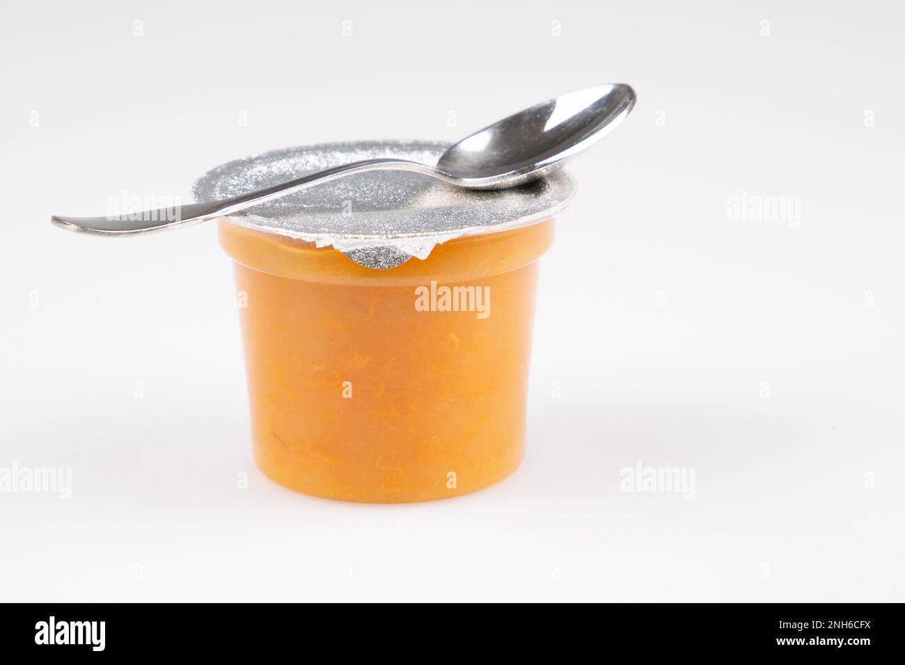 orange peach apricot compote puree or sauce jam with spoon Stock Photo ...