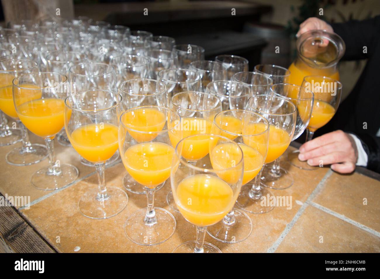 Rum punch juice is ready to serve service by the waiter during buffet ...