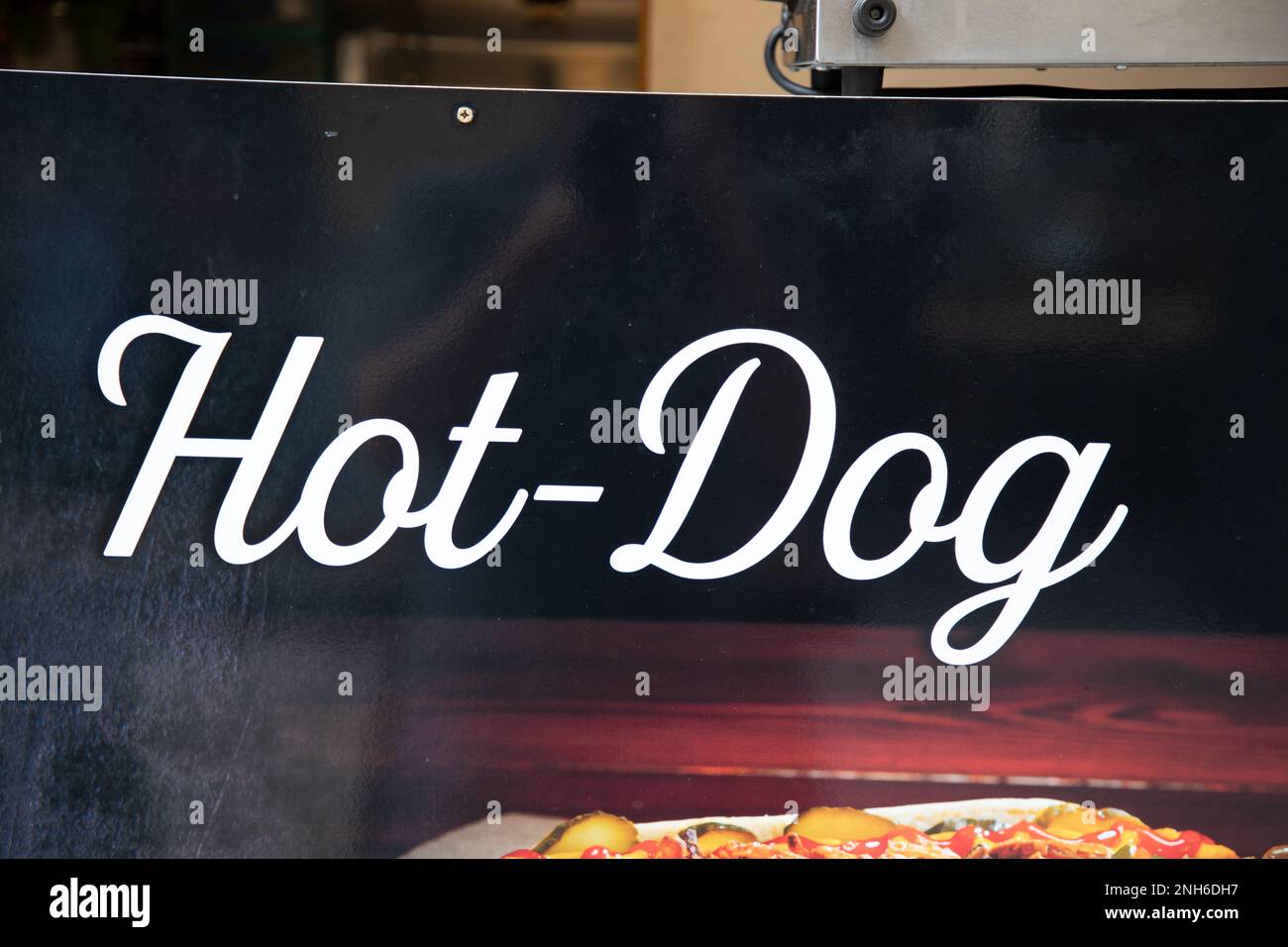 hot-dog fast food restaurant text sign on wall facade entrance in ...