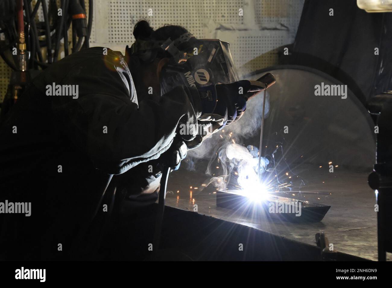 Coast Guard Petty Officer 2nd Class Erin Asher, a damage controlman ...
