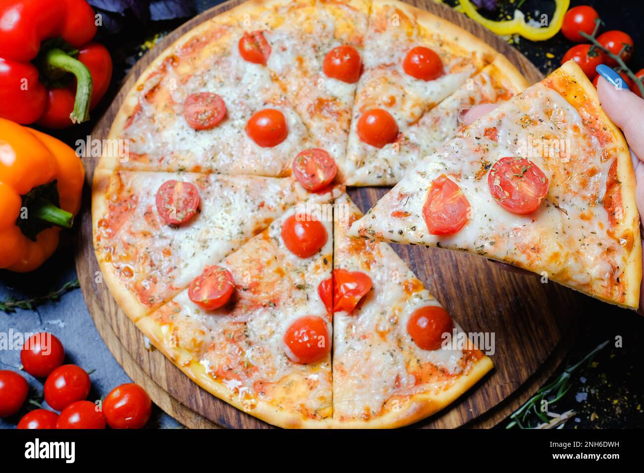 traditional italian cuisine pizza slice tomato Stock Photo - Alamy
