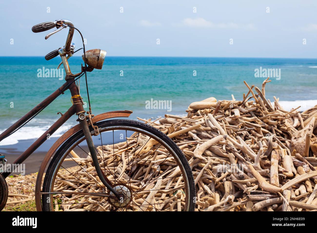 Old bicycle parked on tropical sea beach Stock Photo - Alamy