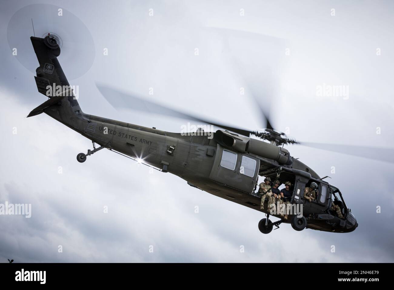 U.S. Army Special Forces Soldiers ride on a Black Hawk (UH-60 ...