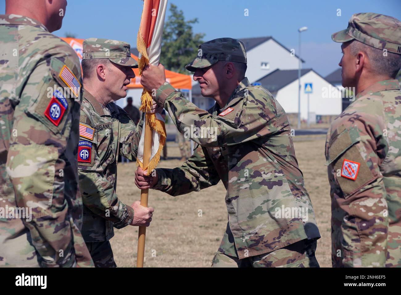U.S. Army Col. Ronald Iammartino Jr, (right), accepts command of the 2d Theater Signal Brigade ...