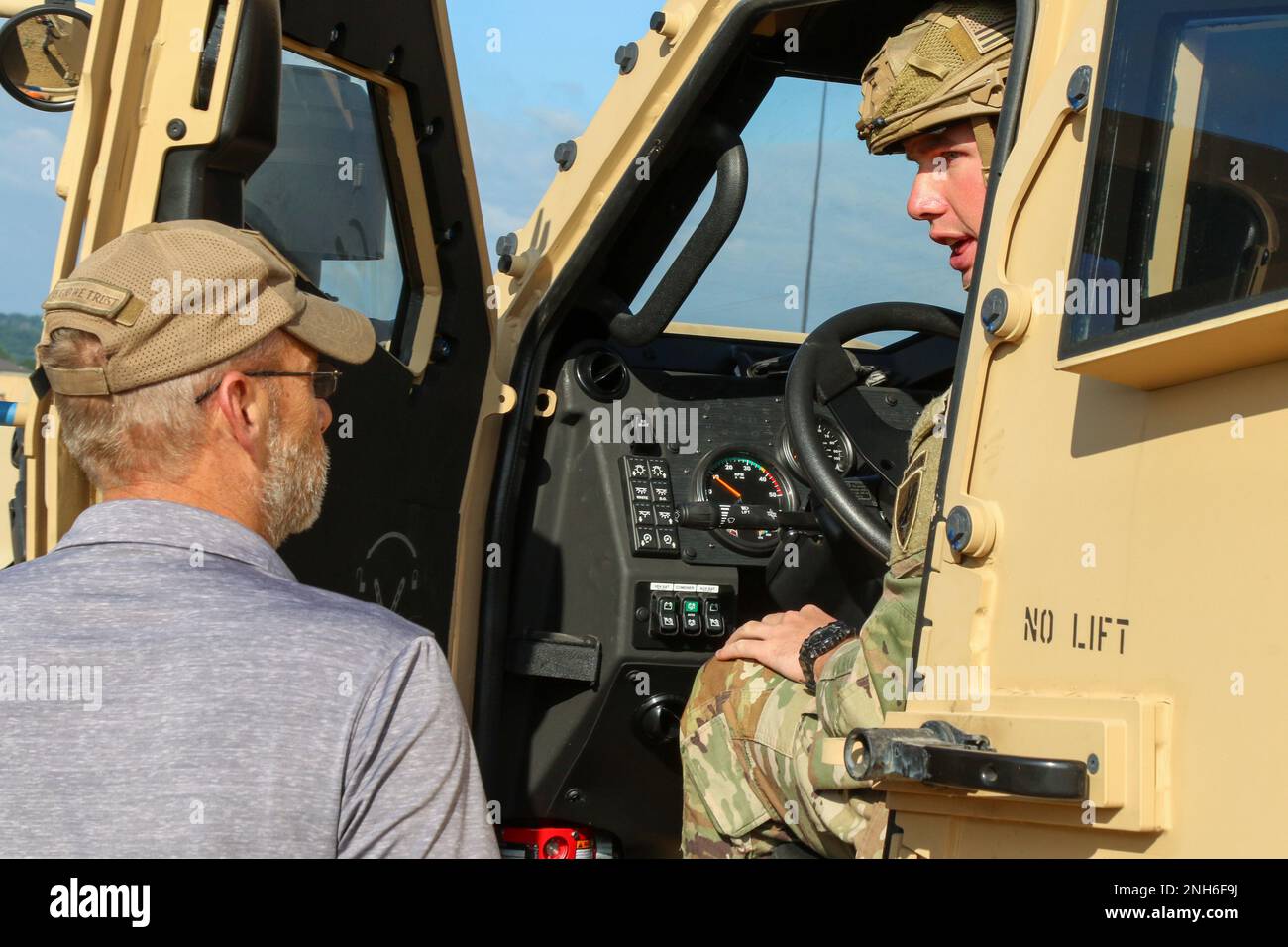 Army Reserve Sgt. Sam Lehman, left, a civil affairs operator with the ...