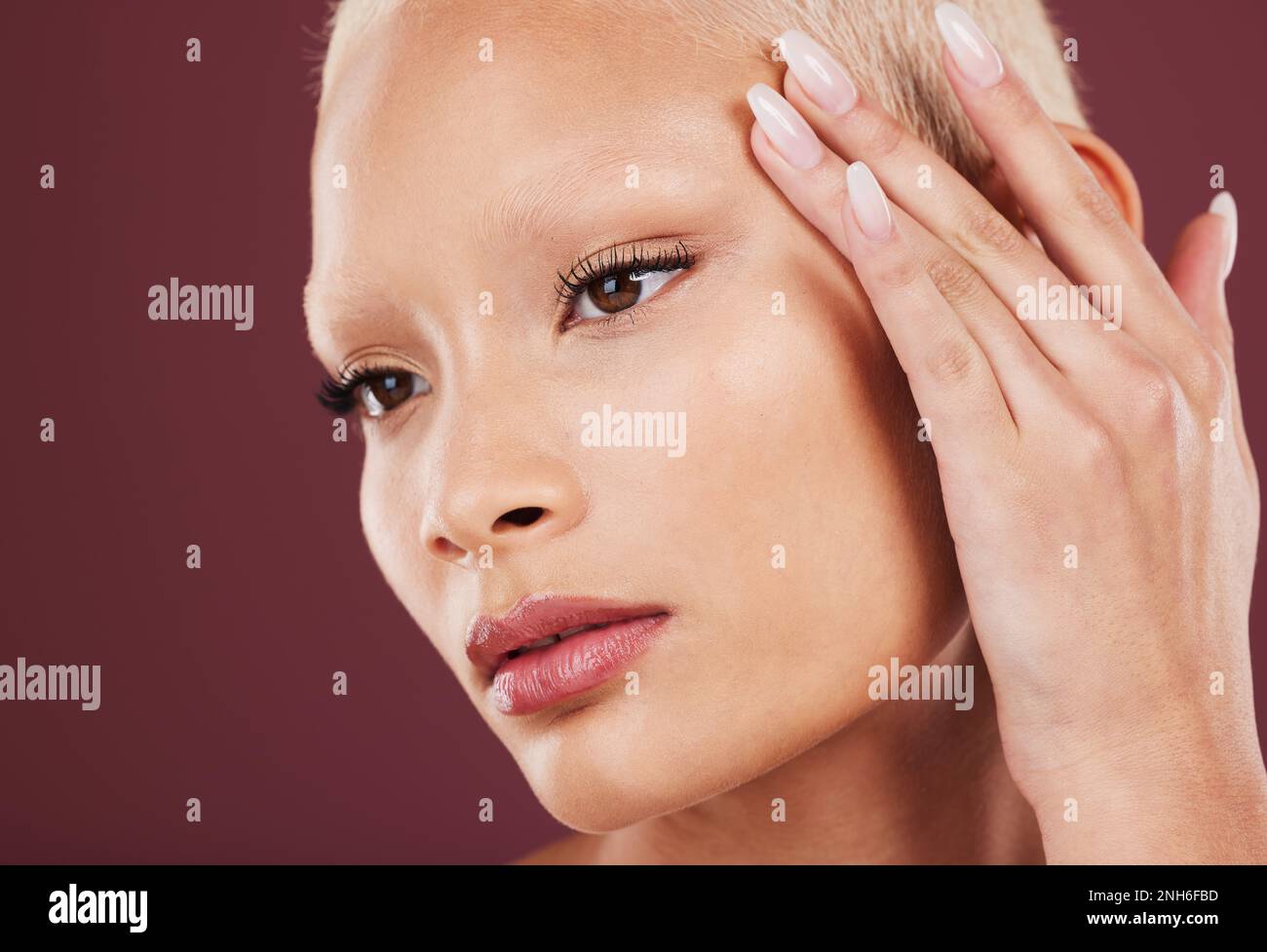 Thinking, beauty and face skincare of woman in studio isolated on a red ...