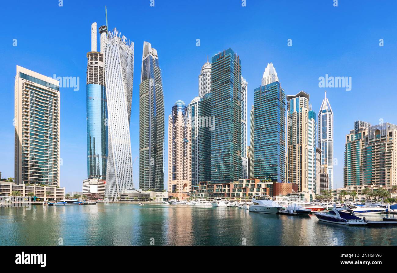 Dubai marina promenade in UAE. Highrise residential buildings, business ...