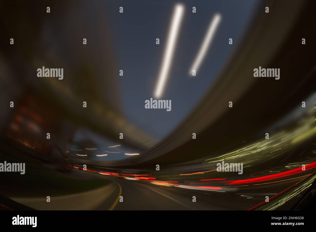 An image of a busy highway, with traffic moving quickly and creating a ...