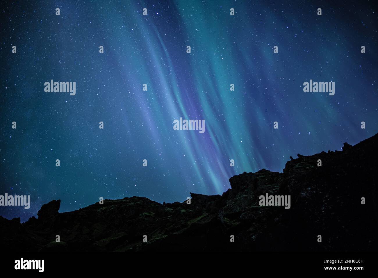 A stunning view of the northern lights over Reykjavik during the polar ...