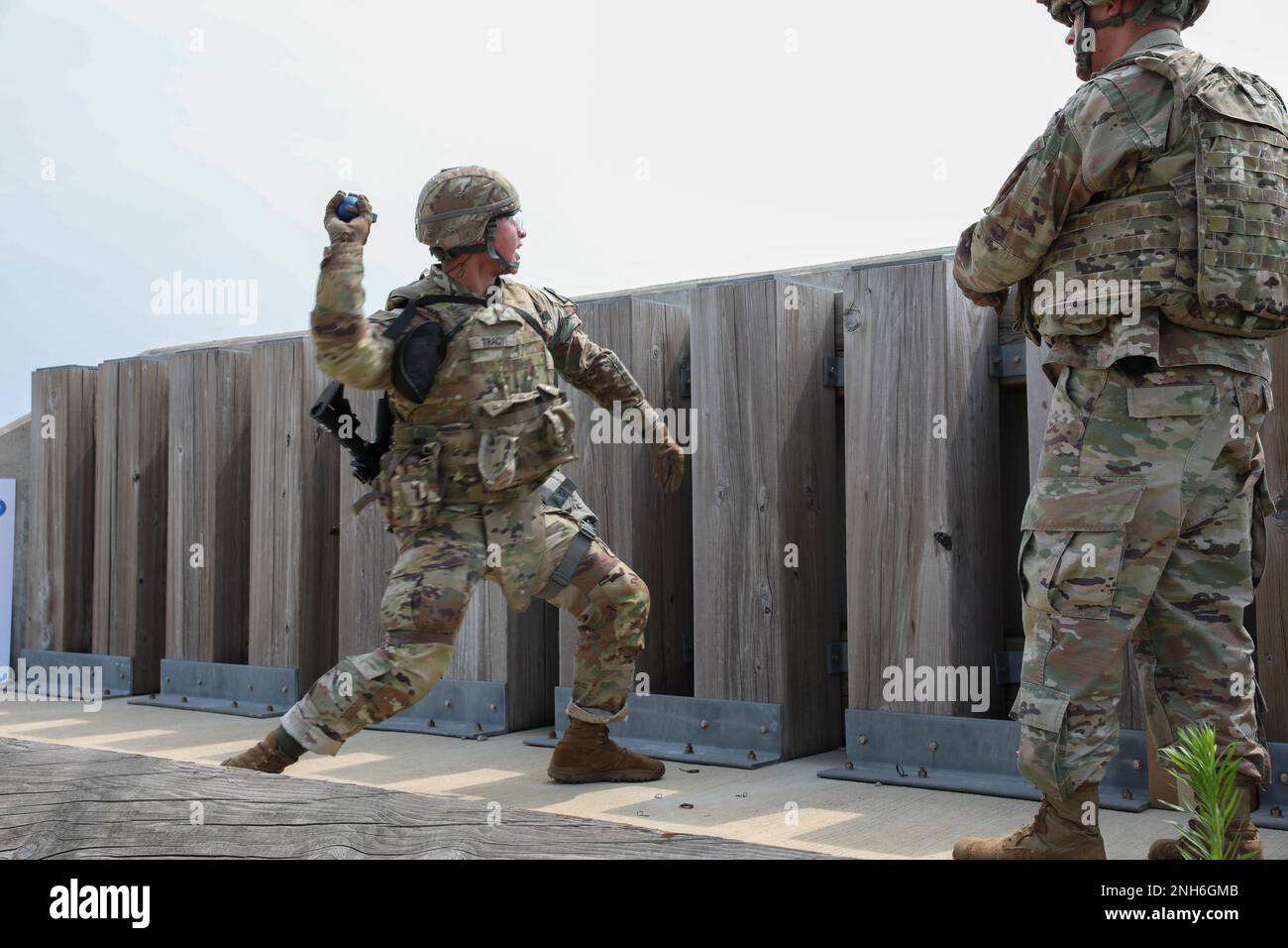 Pvt. Steven Tracy, a 35th Air Defense Artillery Brigade Soldier, throws ...