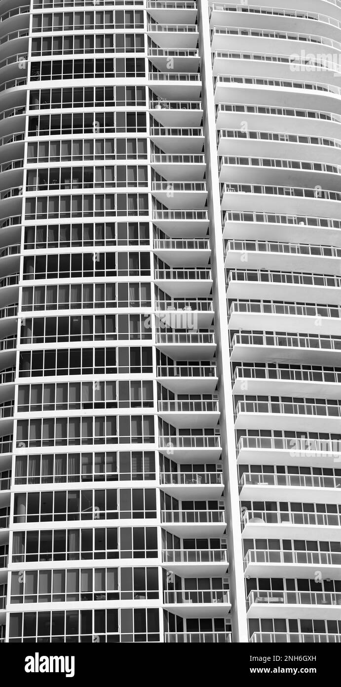 Architectural detail of high-rise apartment building facade with ...