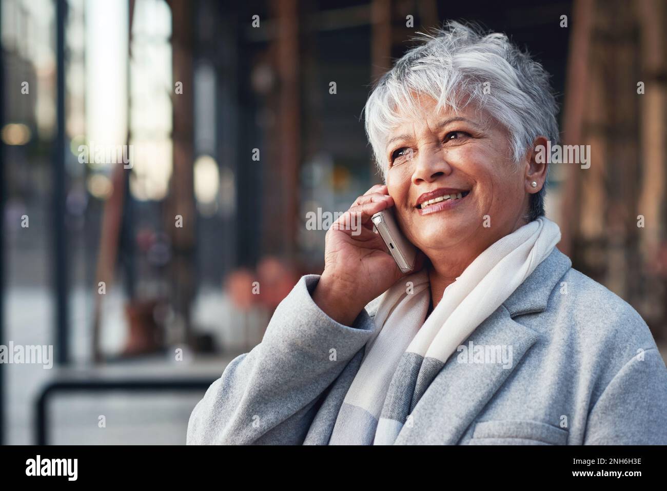 City, phone call and happy, mature woman or lawyer outside law firm in ...